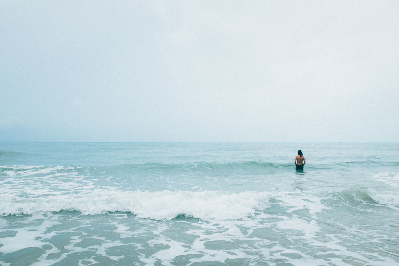 Side view of a man standing against cloud | ID: 94698953
