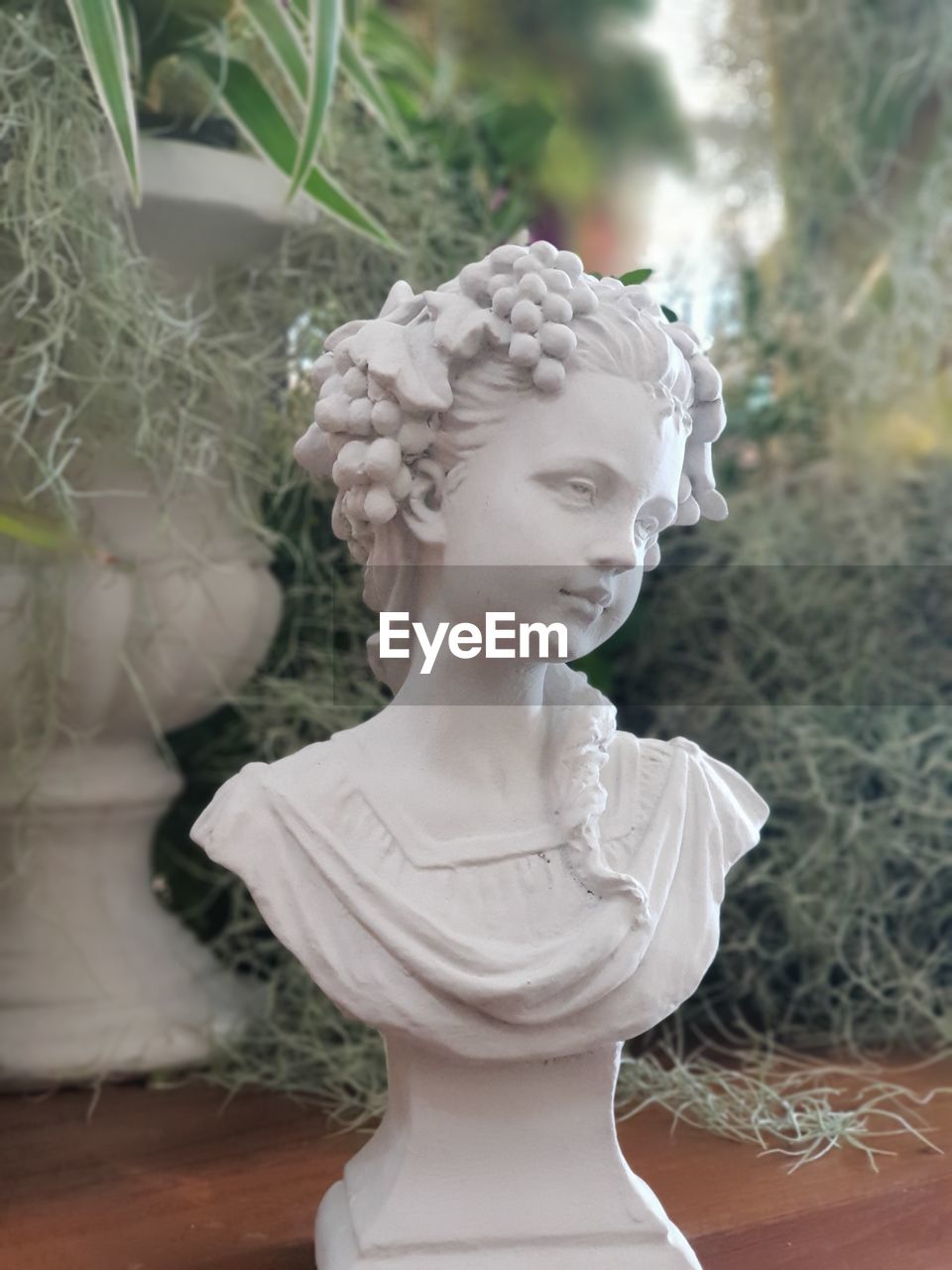 Close-up of statue on table | ID: 128175019