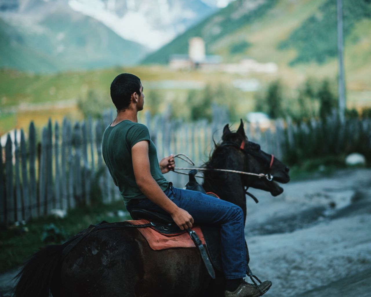 Side view of man riding horse against | ID: 127654061