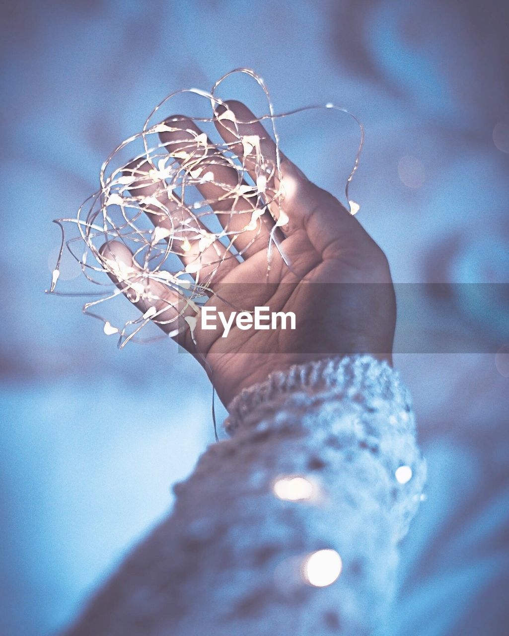 Hand holding led lights | ID: 101808155