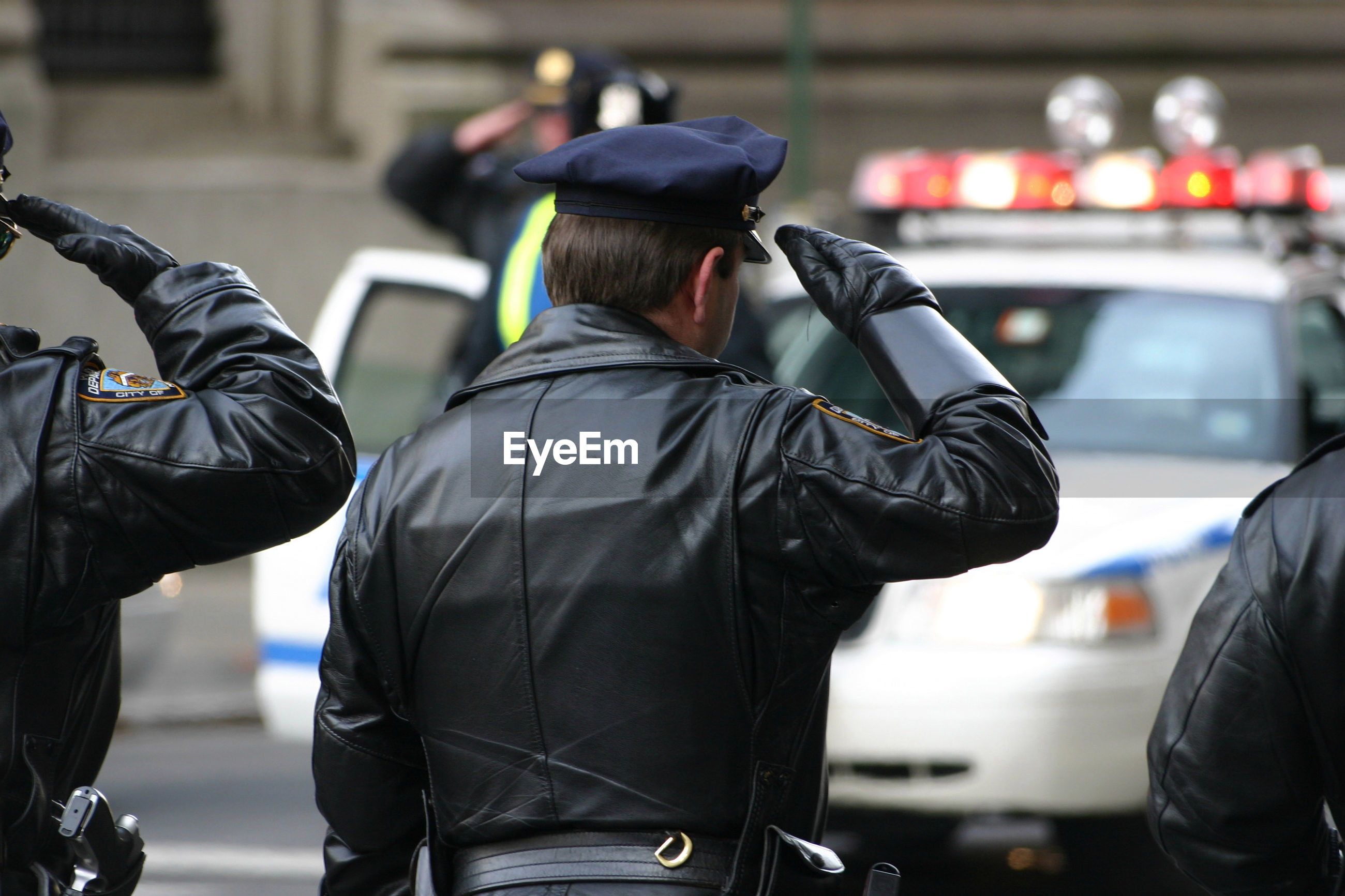 Rear view of police officers | ID: 90171494