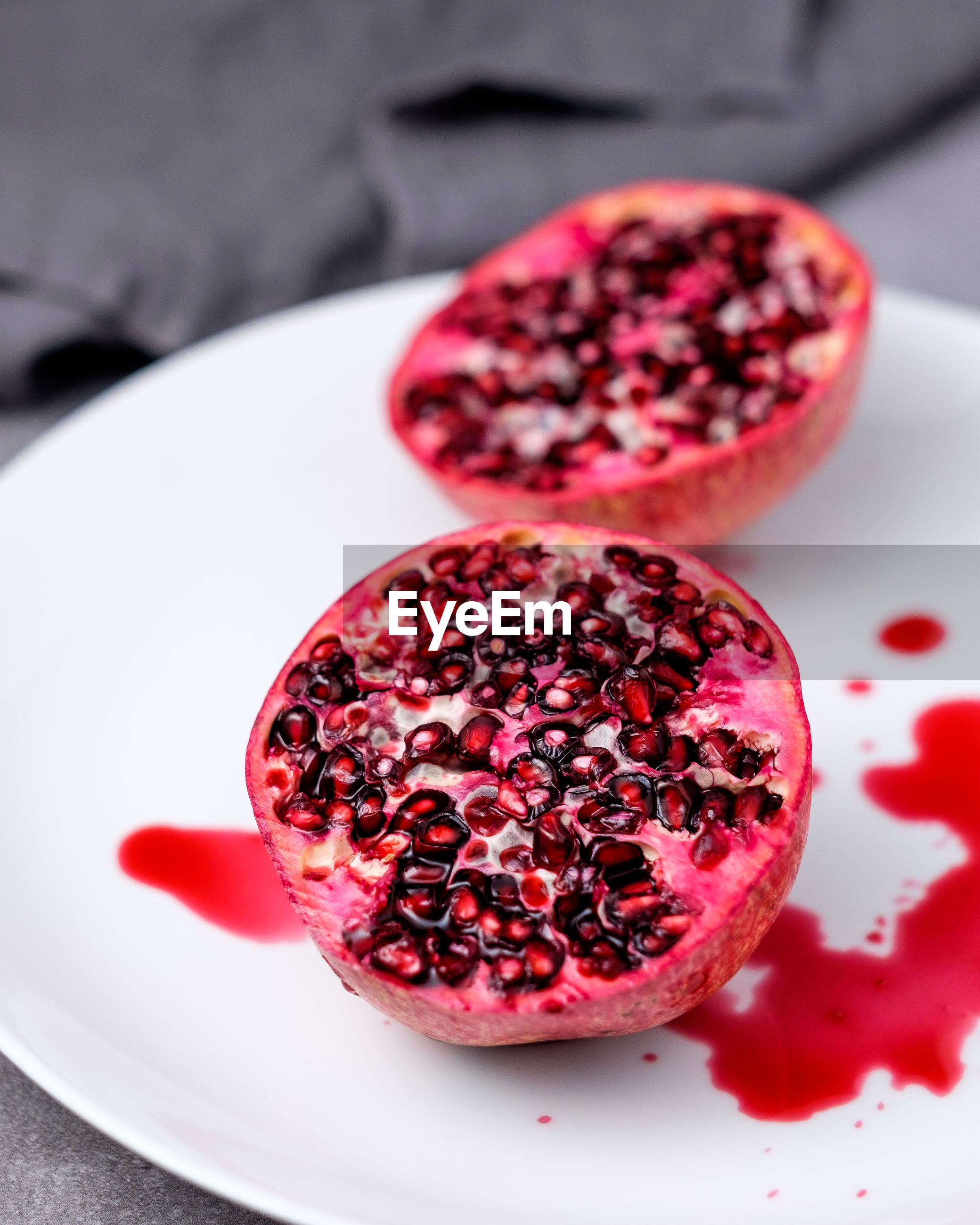 Close-up of pomegranates in plate | ID: 81413072