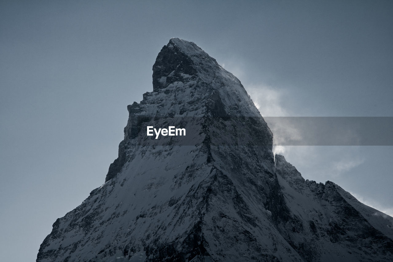 Low angle view of mountain range against sky | ID: 117776843