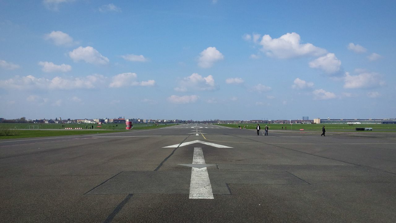 View of airport runway against sky | ID: 87402499