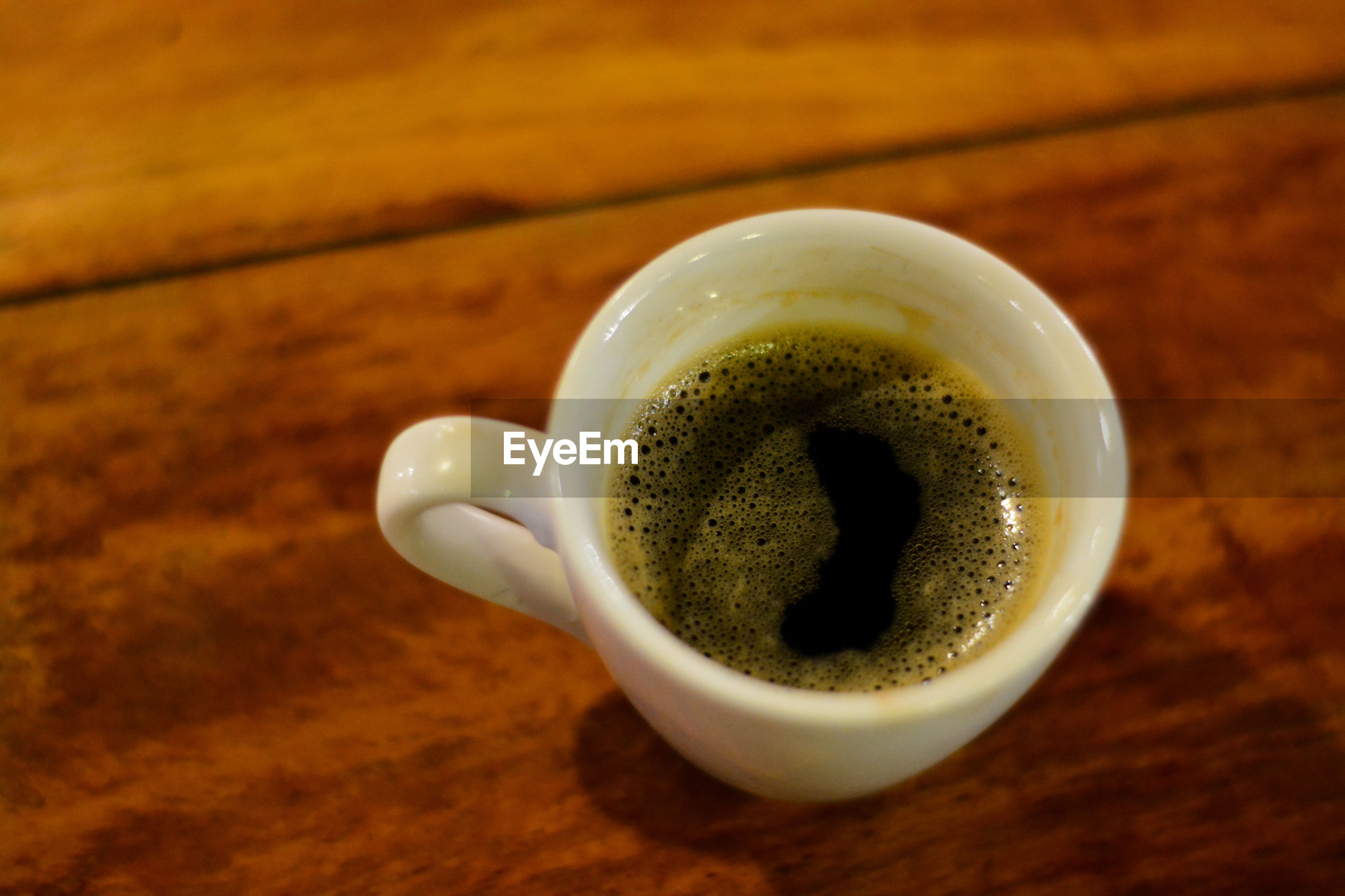 High angle view of cup of coffee | ID: 136325076