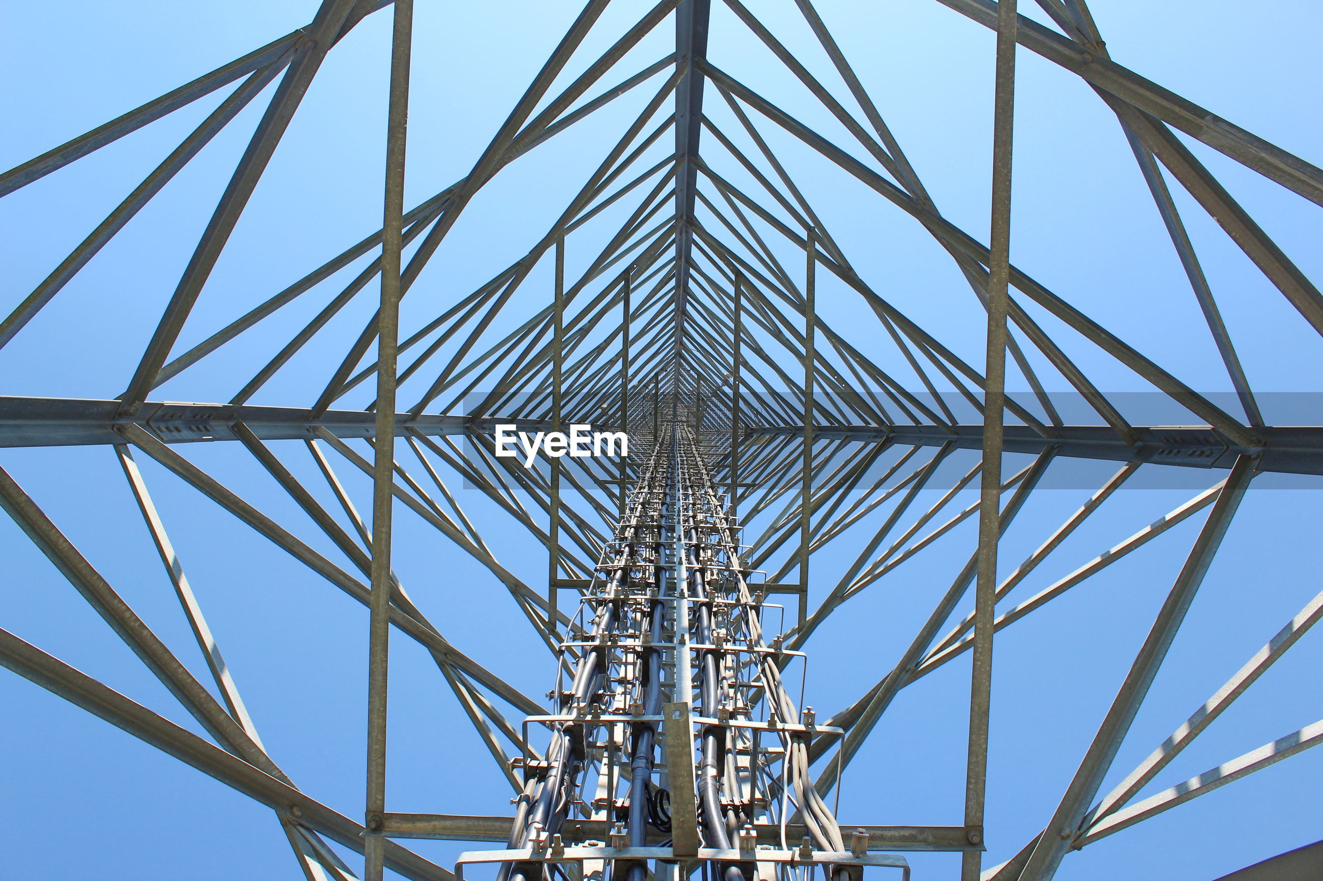 Directly below shot of metallic structure | ID: 128941322